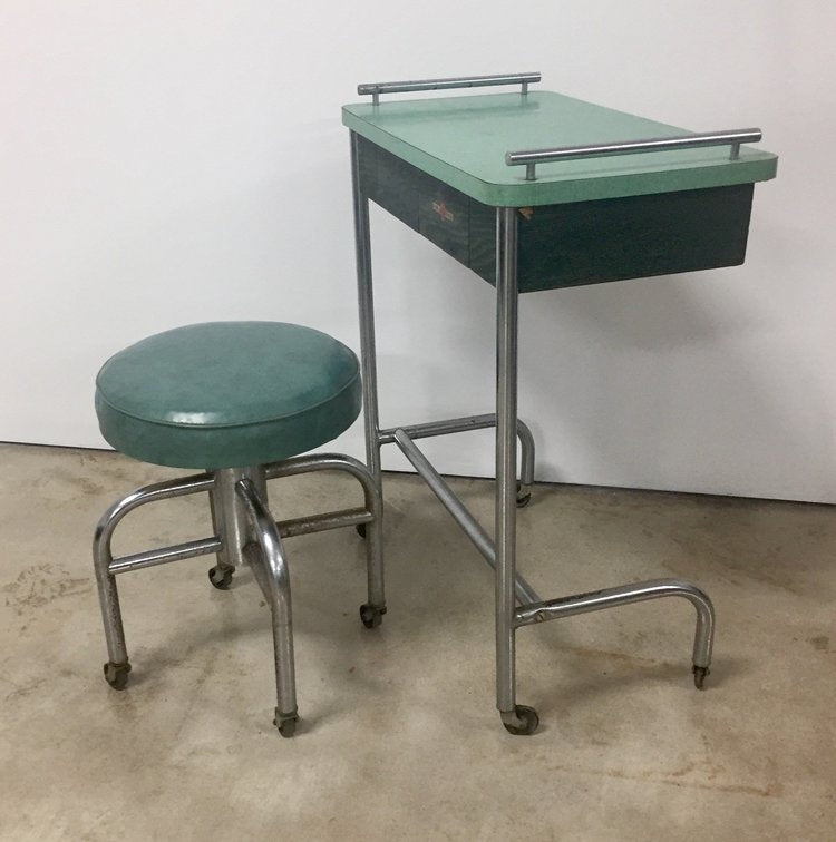 Vintage industrial tubular steel rolling stool and cantilevered table ...