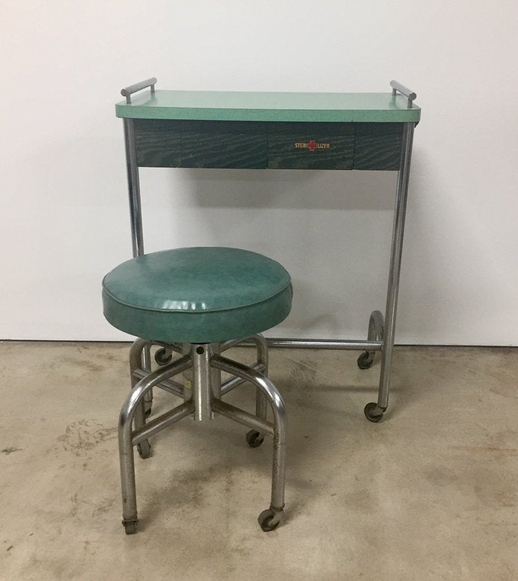 Vintage industrial tubular steel rolling stool and cantilevered table ...